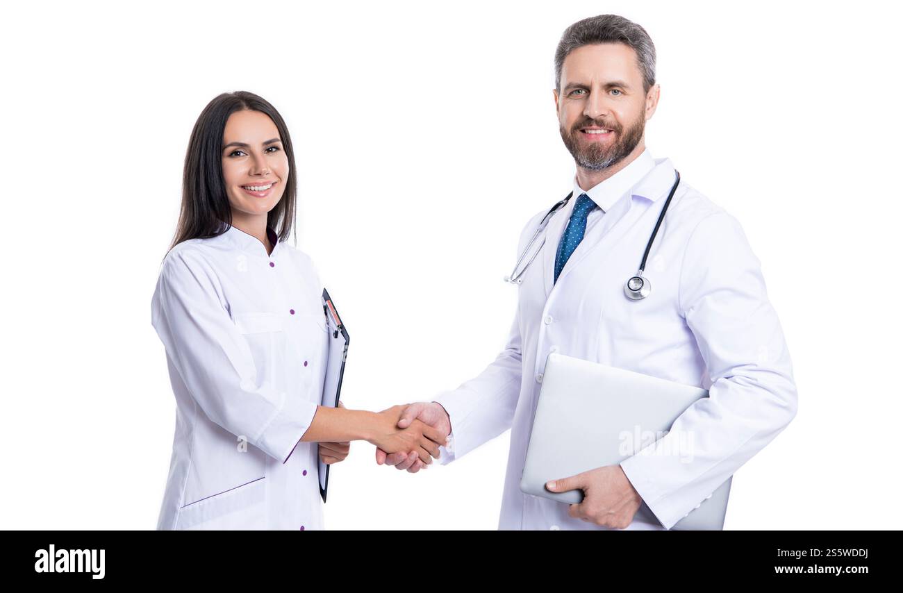 successful treatment. doctor handshake with nurse. two doctor shaking ...