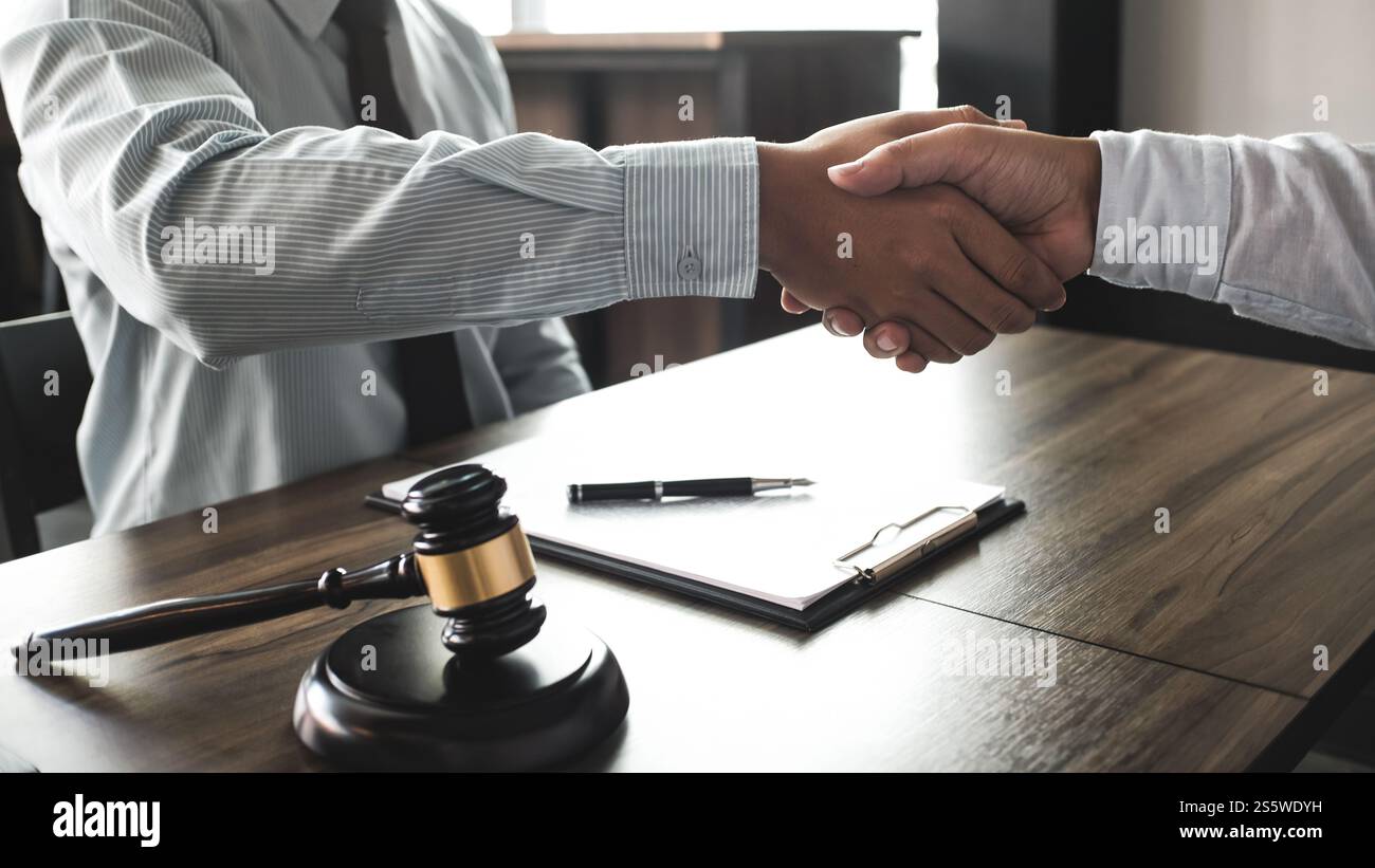 lawyer handshake with client. Business partnership meeting successful ...