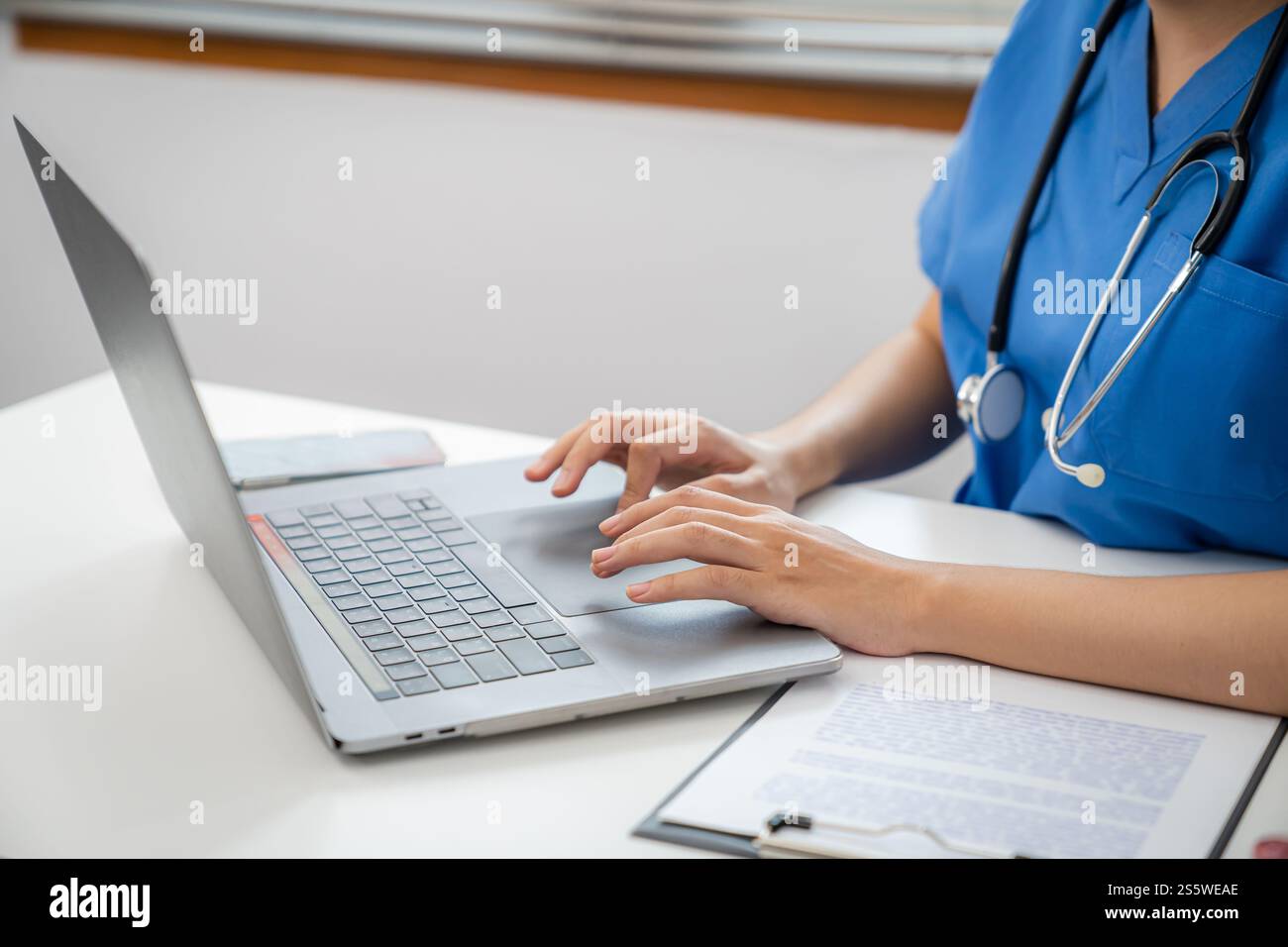 Medical technology network team meeting concept. doctor hands typing on ...