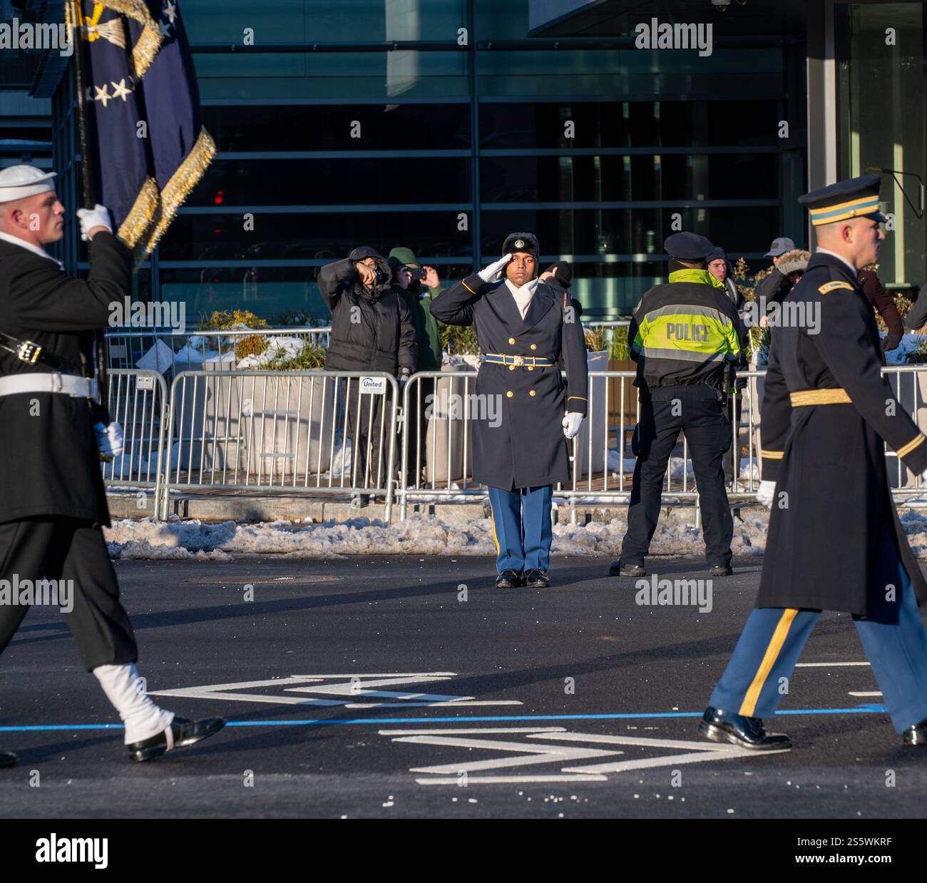A Navy honor guard soldier salutes as President Jimmy Carter's casket ...