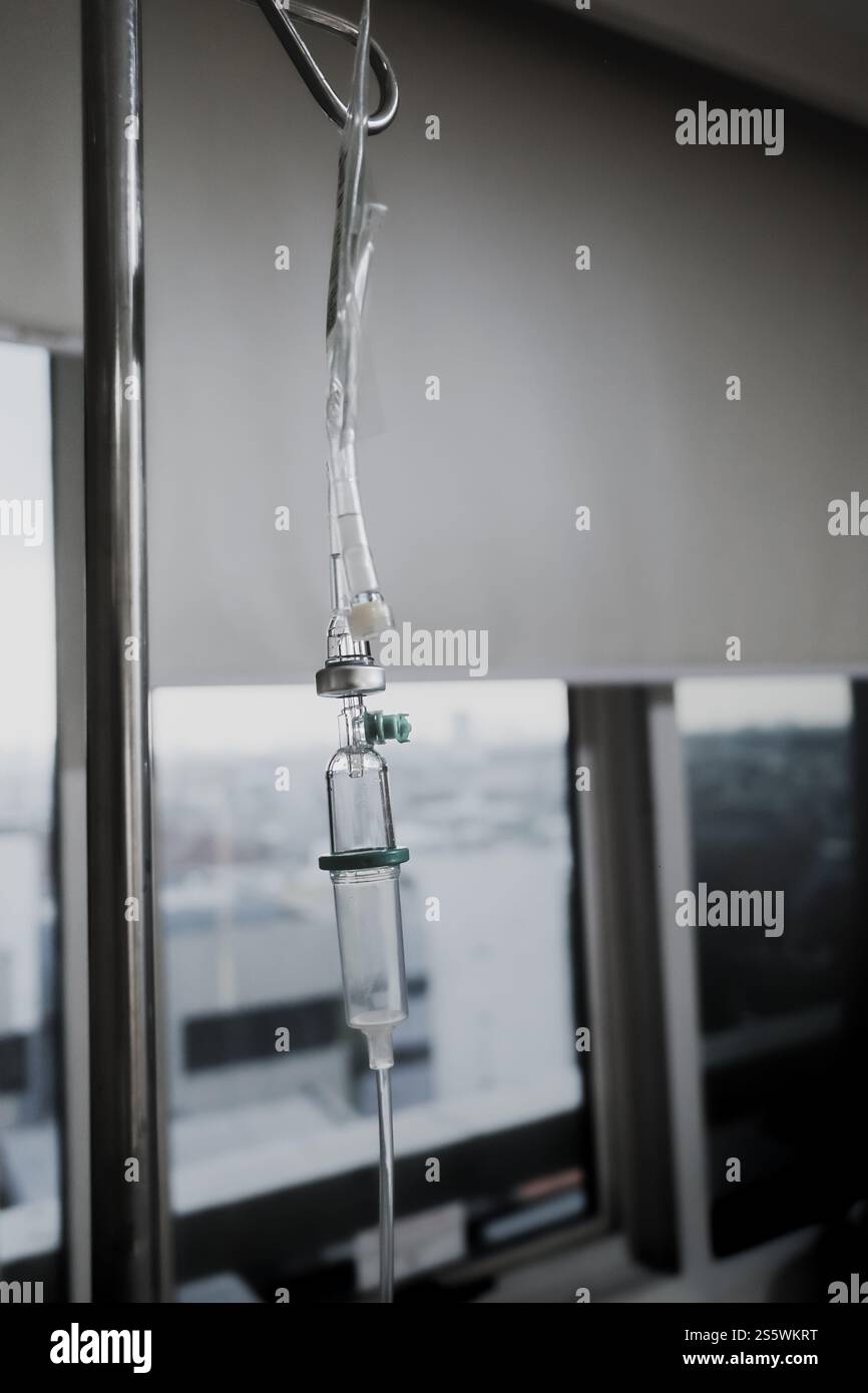 Closeup view of intravenous infusion drip attached to a pole at ...