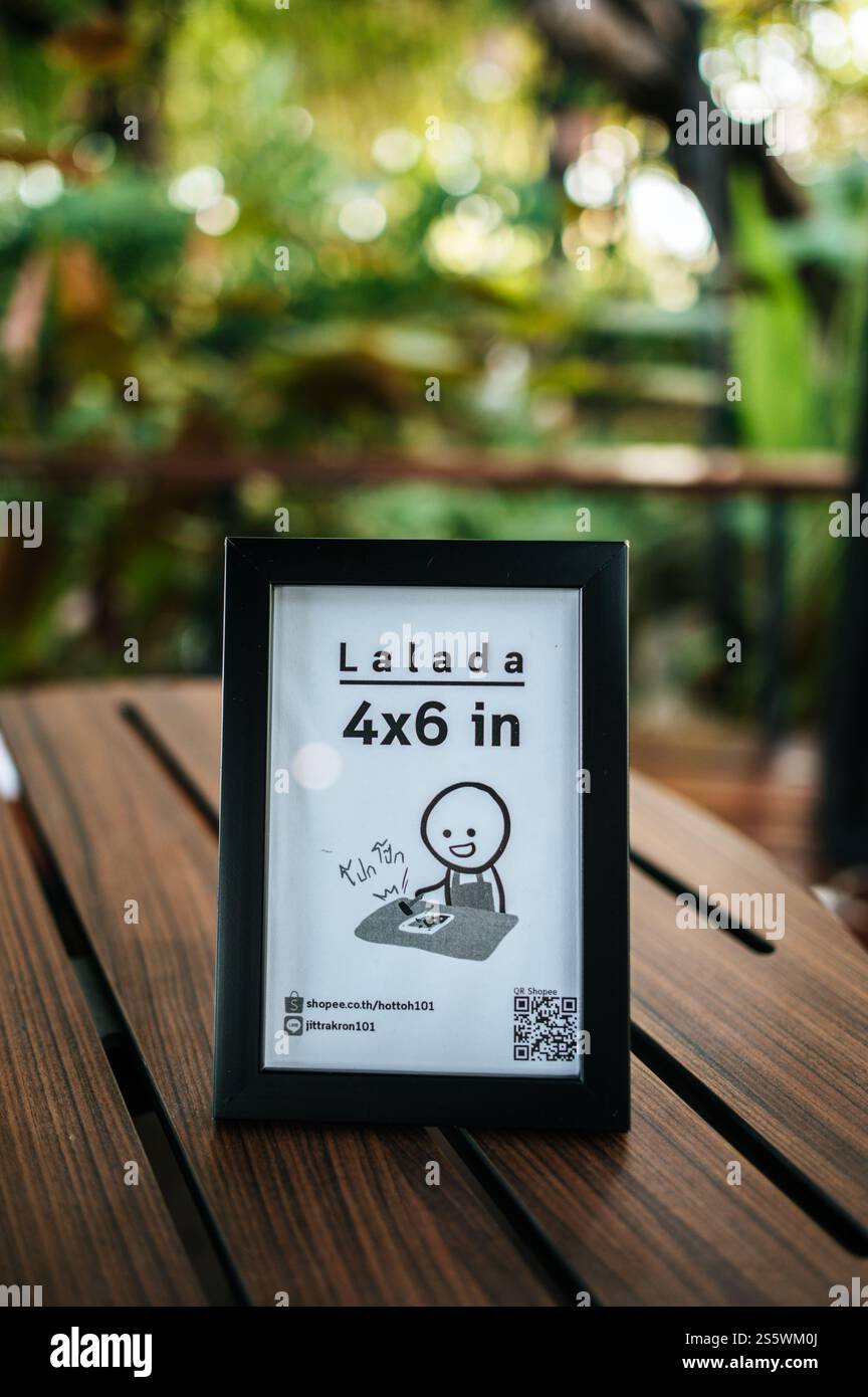 black frame promotion board on the table in garden Stock Photo - Alamy