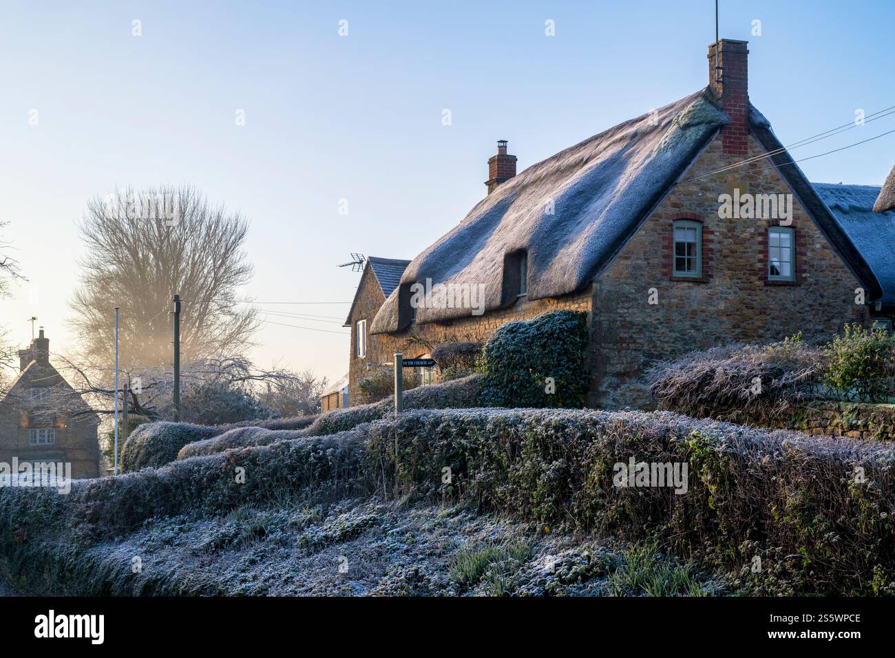 Thatched cottages in the frost. Ebrington, Chipping Campden, Cotswolds ...