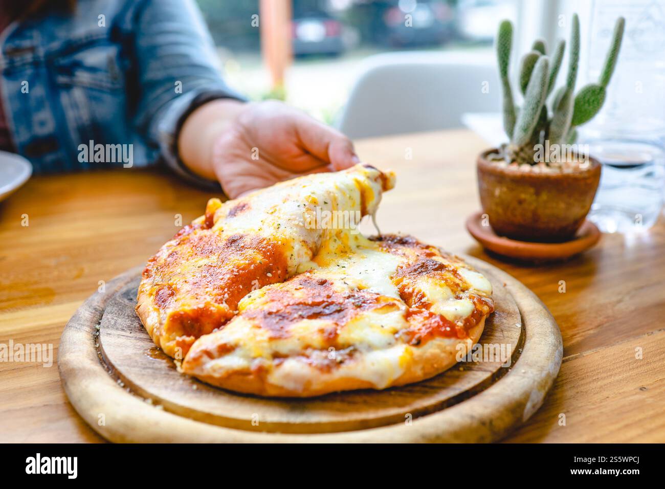 A slice of fresh hot Very cheesy vegetarian pizza mozzarella cheese ...