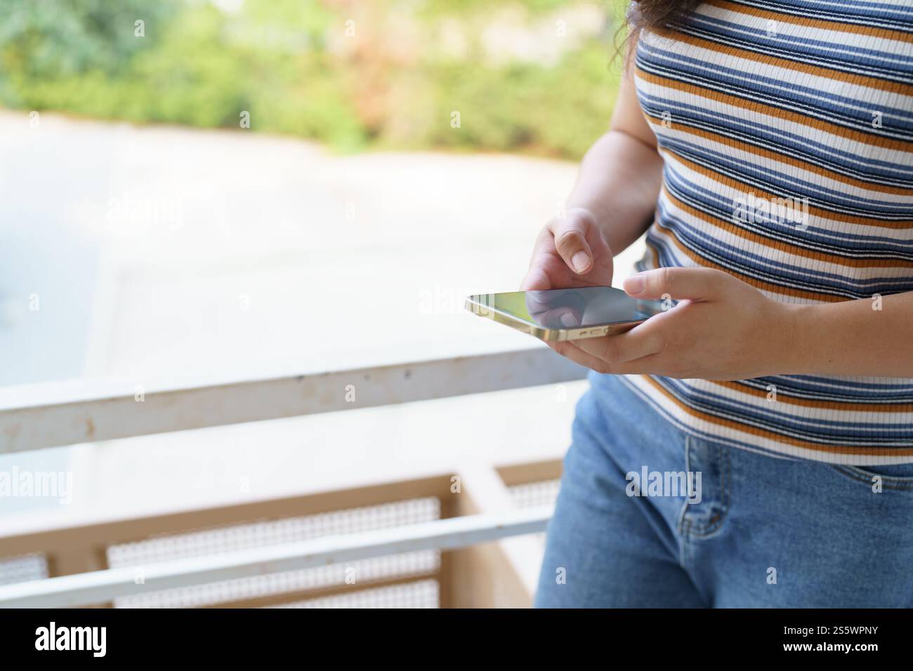 Womens Hands holding cell telephone working mobile devices. smart phone ...