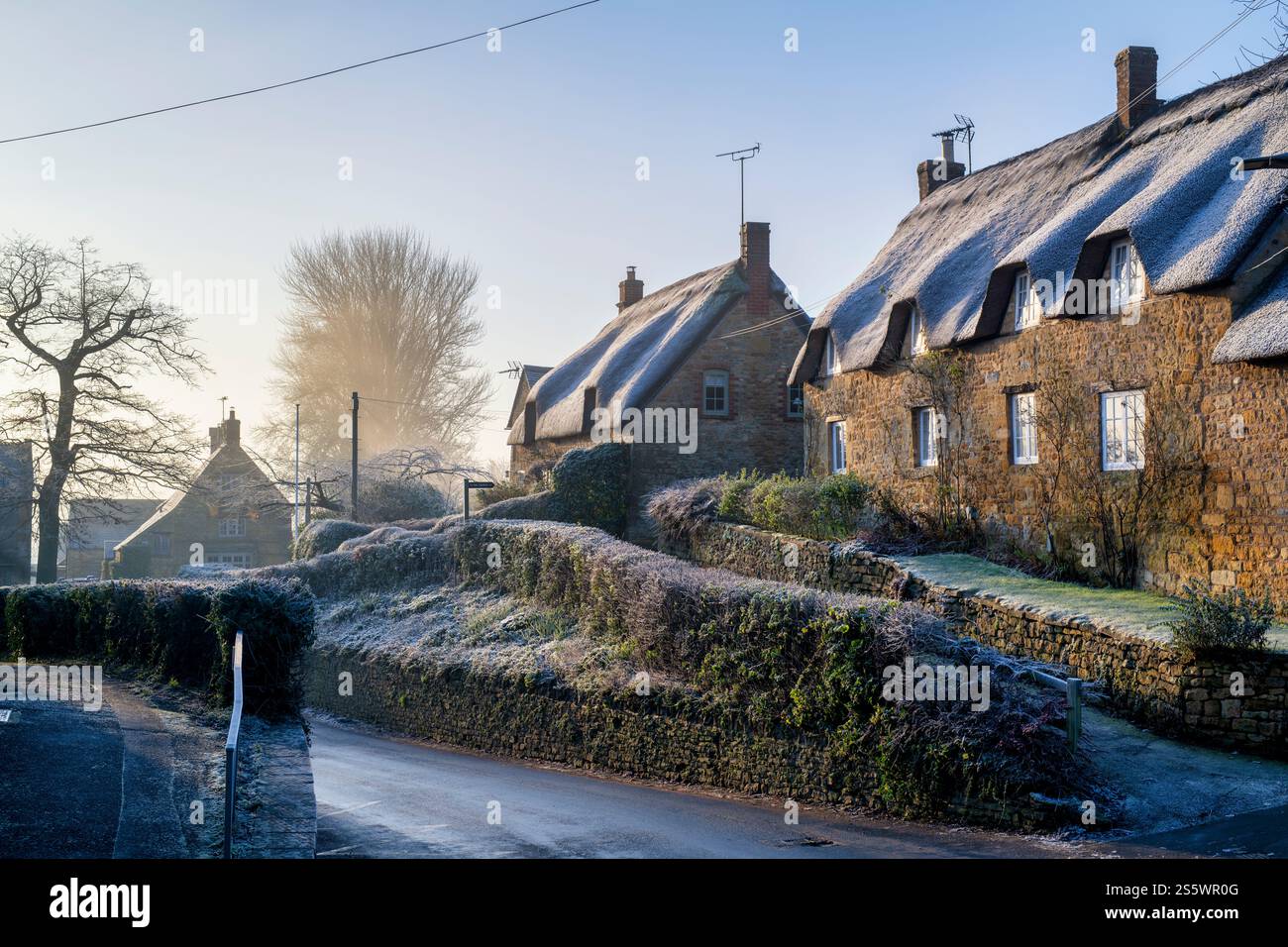 Thatched cottages in the frost. Ebrington, Chipping Campden, Cotswolds ...