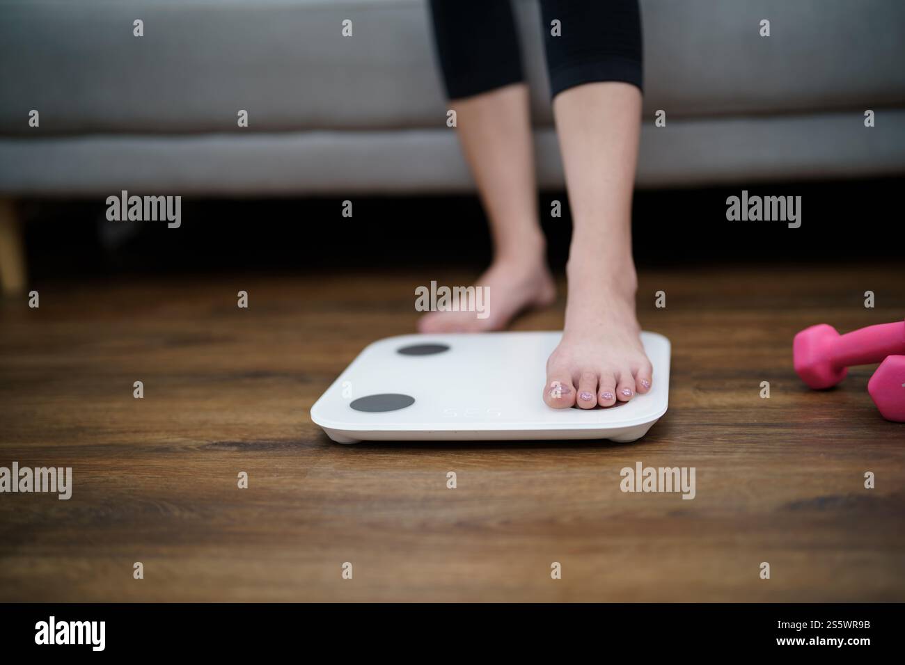 Fat diet and scale feet standing on electronic scales for weight ...