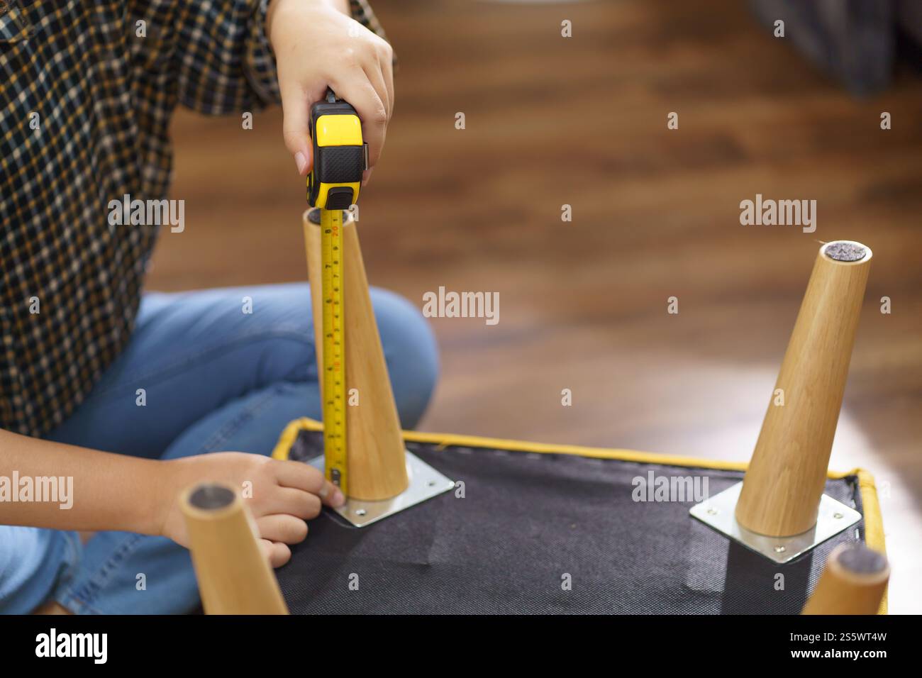 Asian Woman self repairs furniture renovation using equipment to diy ...