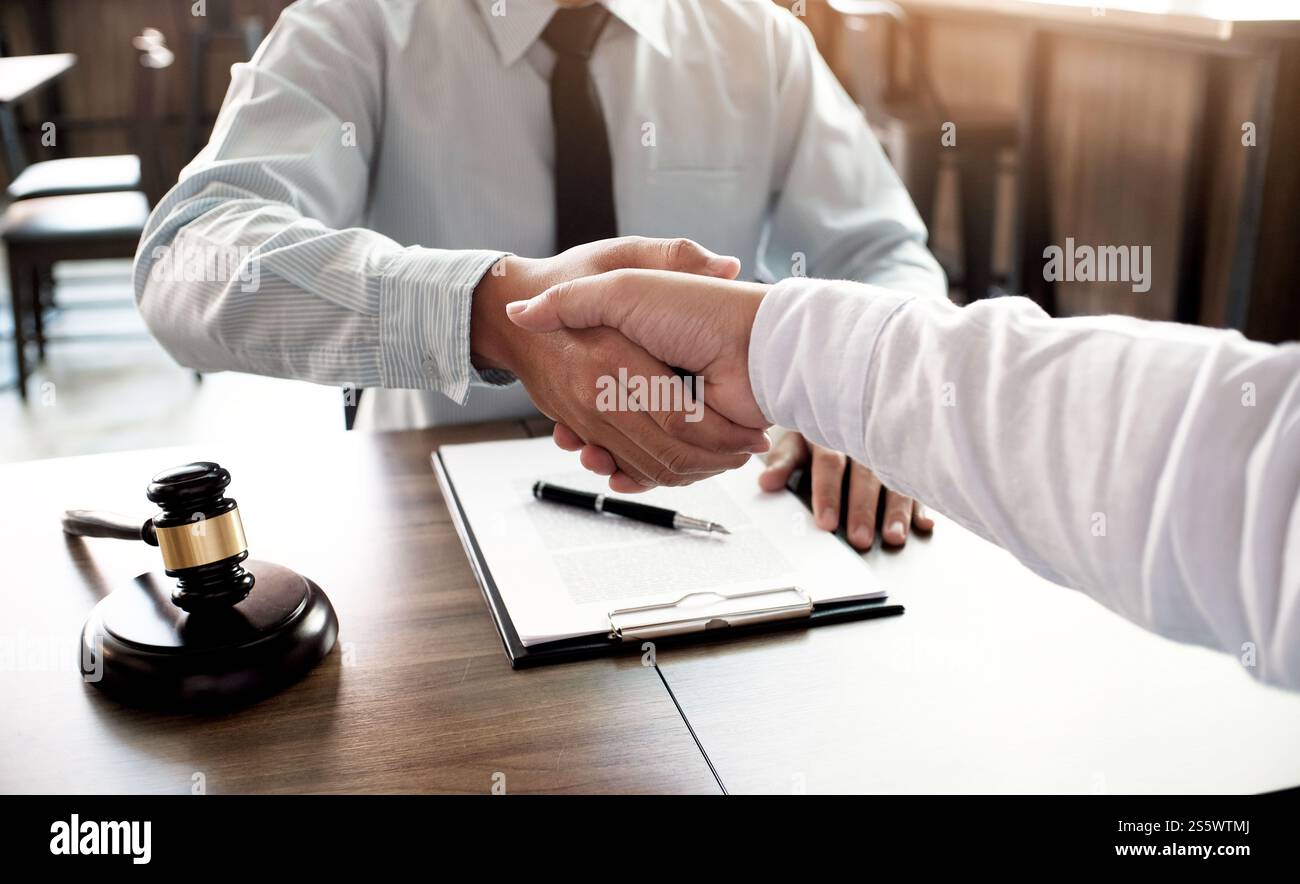 Lawyer partnership businessman handshake hi-res stock photography and images - Alamy