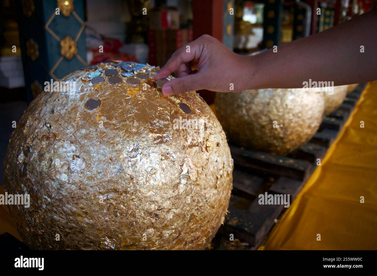Coin donation Boundary stones blessing at Buddhist temple Stock Photo ...