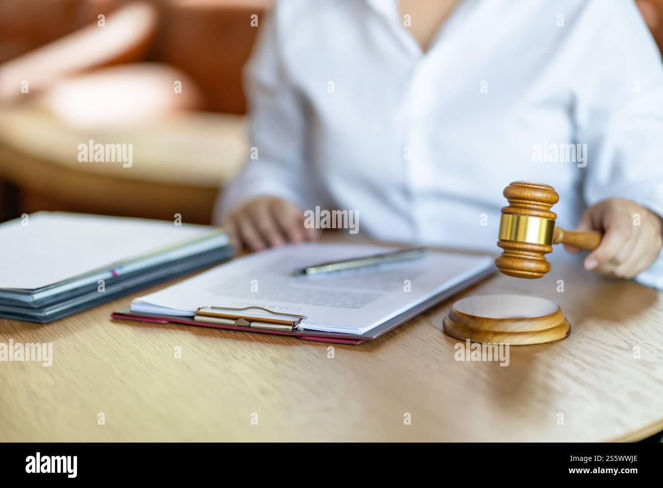 Lawyer Legal counsel presents to bid sale judgment mallet with judge ...