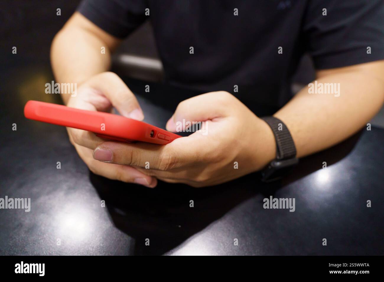 Man playing game on mobile phone. gamer boy playing video games holding ...