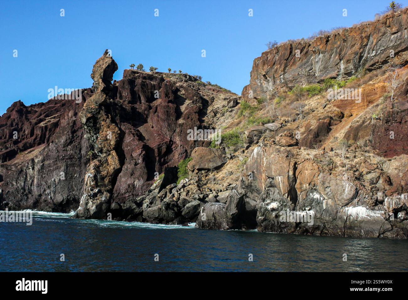 Praying Priest Rock in Buccaneer Cove, Santiago Island, Galápagos, a ...