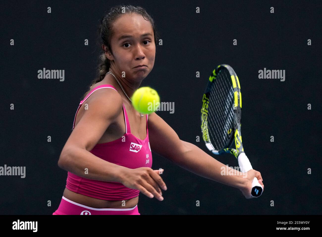 Leylah Fernandez of Canada plays a forehand return to Cristina Bucsa of Spain during their ...