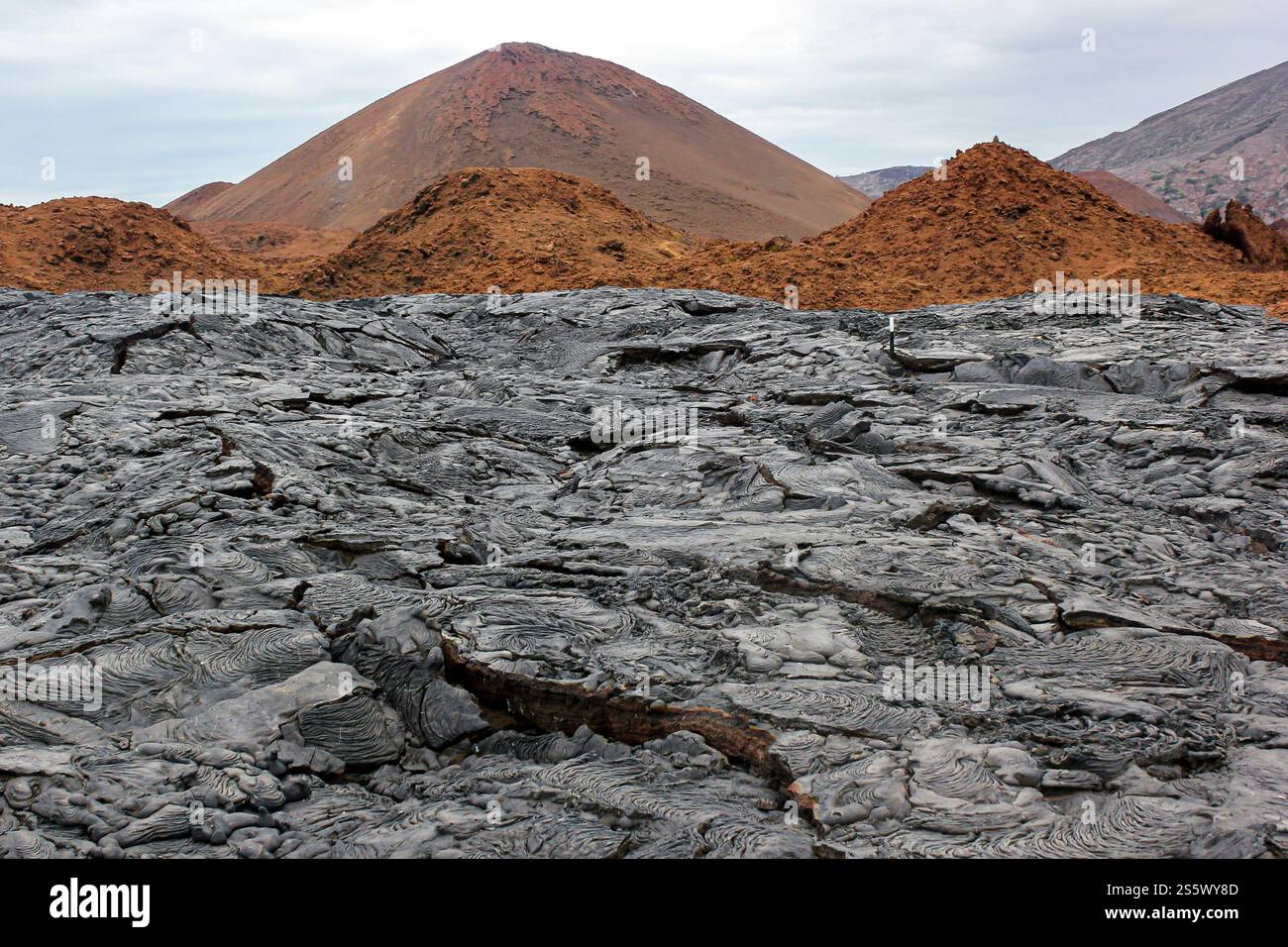 Volcanic lava field in Sullivan Bay, Santiago Island, with dramatic red ...
