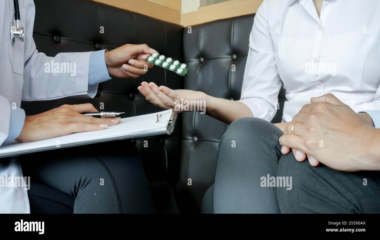 Health care Doctor giving medicine to patient for arthritis pain Stock ...