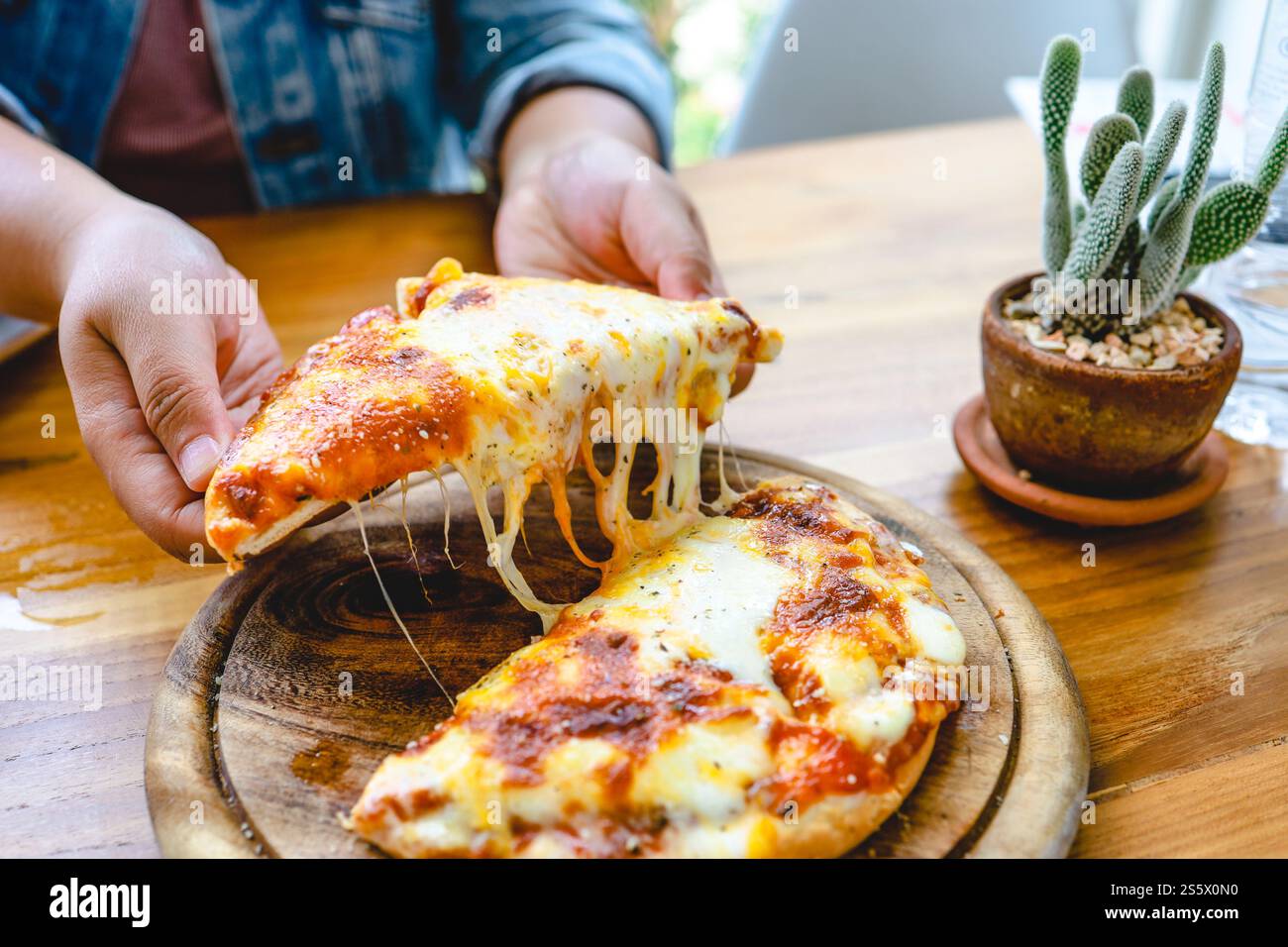 A slice of fresh hot Very cheesy vegetarian pizza mozzarella cheese ...