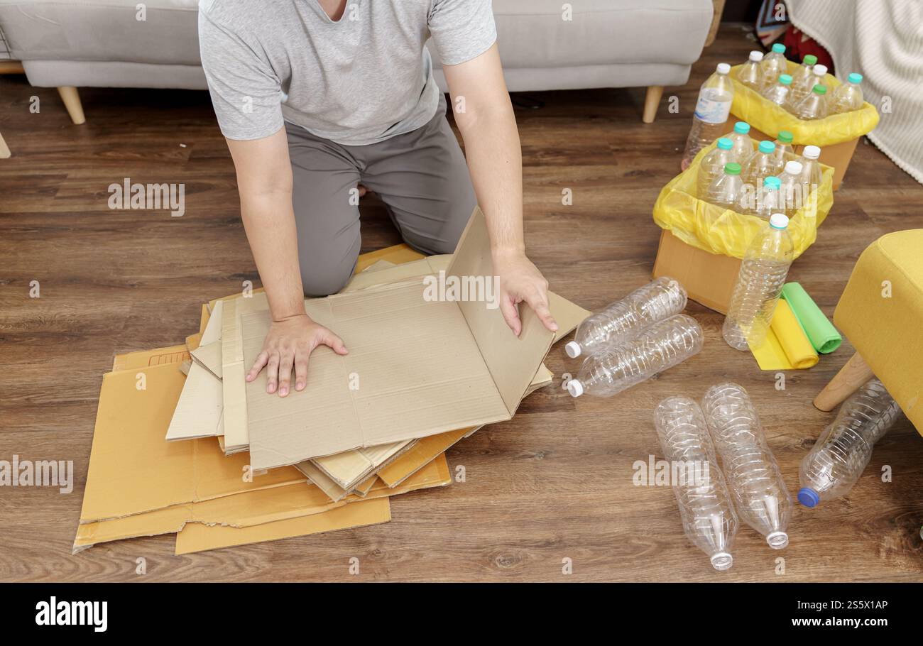 Home recycle eco zero waste concept Man using recycle paper box ...