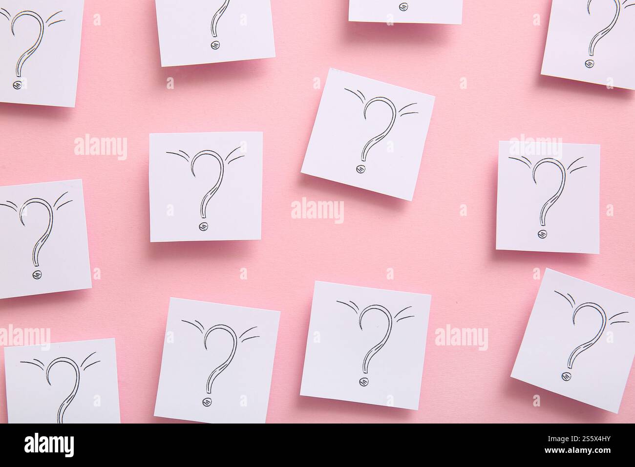 Many sticky notes with question marks on pink background Stock Photo ...
