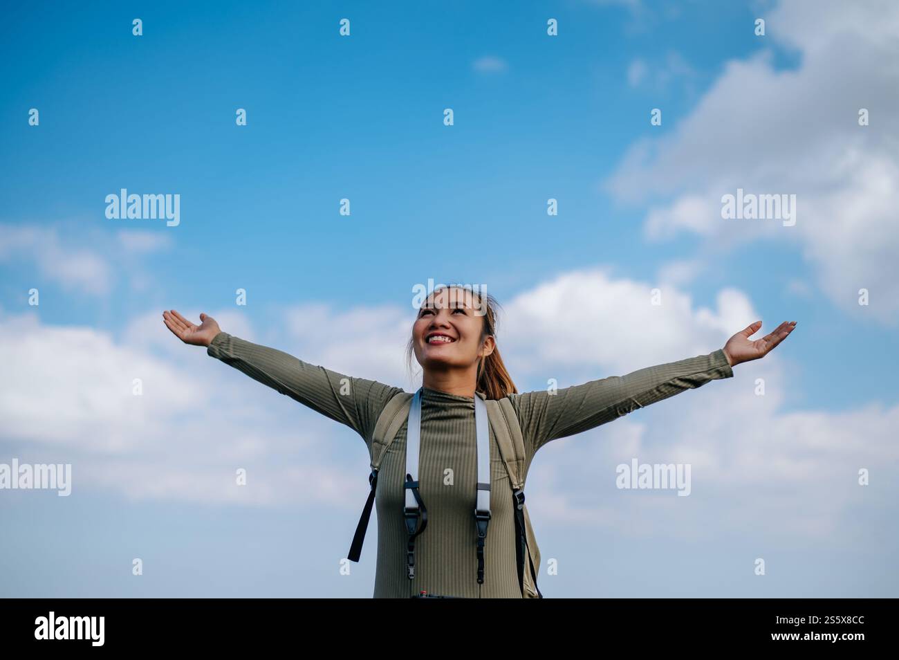 Woman raise hands up hi-res stock photography and images - Alamy