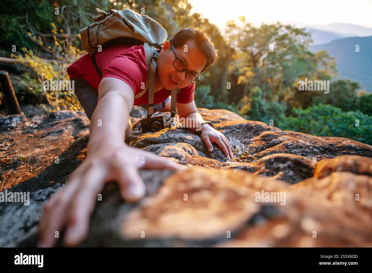 Selective focus, Young tourist backpack man wearing eyeglasses trying ...