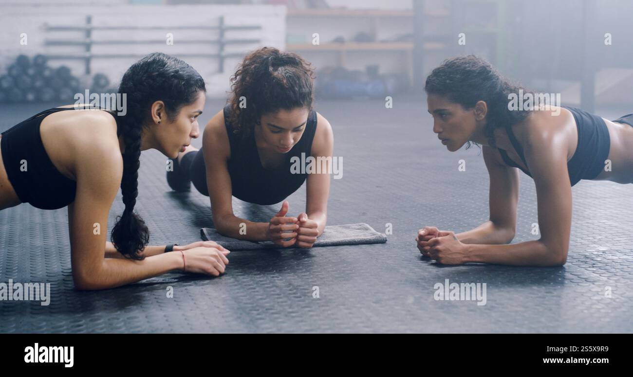Fitness, plank and power with woman friends in gym together for ...