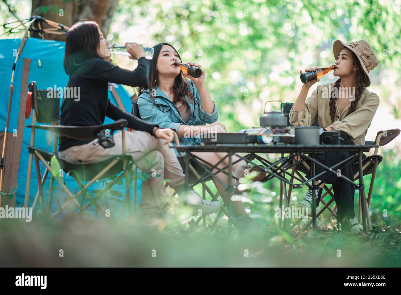 Group beautiful Asian women friends travelers relaxing at front of ...