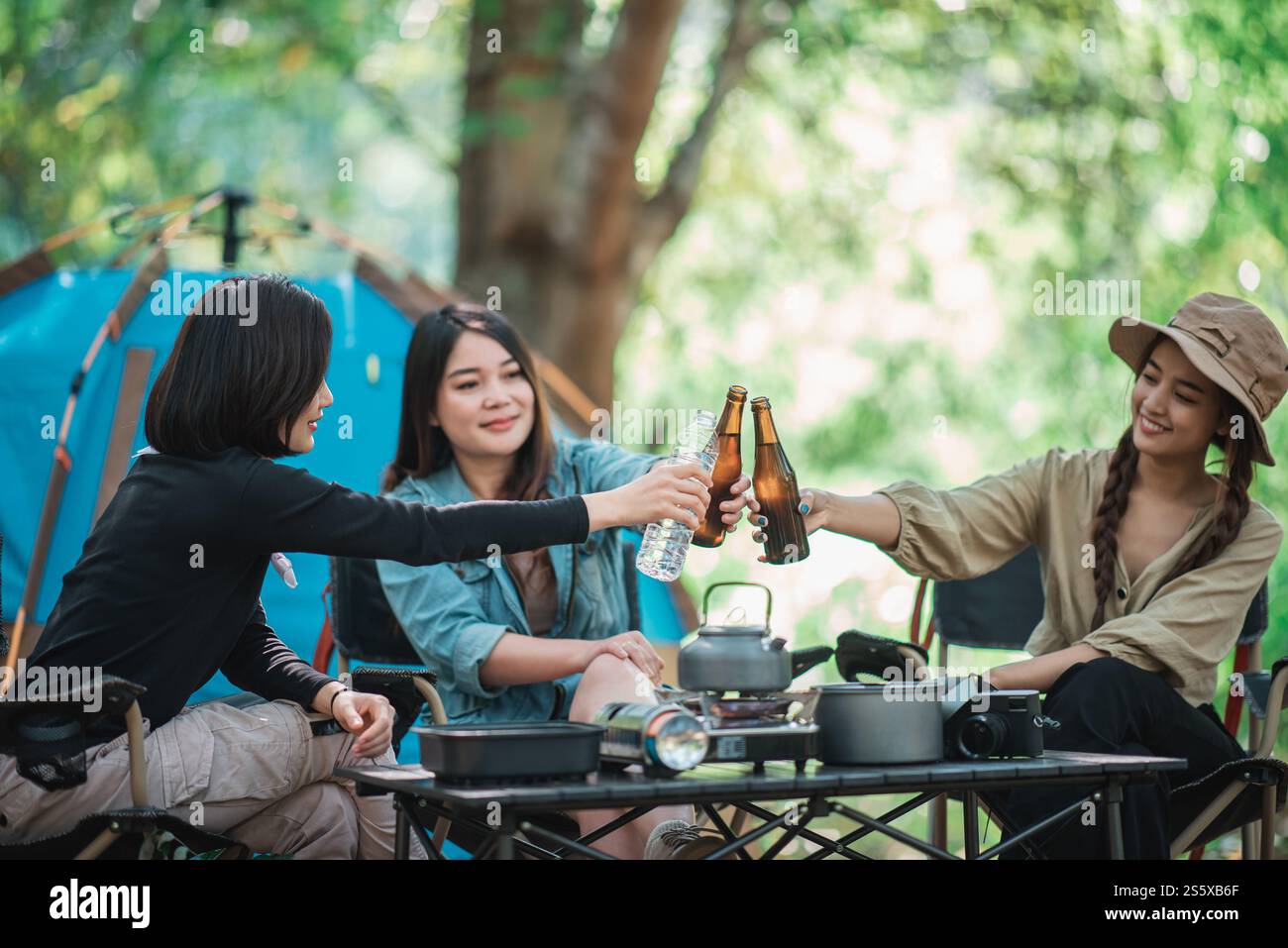Group beautiful Asian women friends travelers relaxing at front of ...
