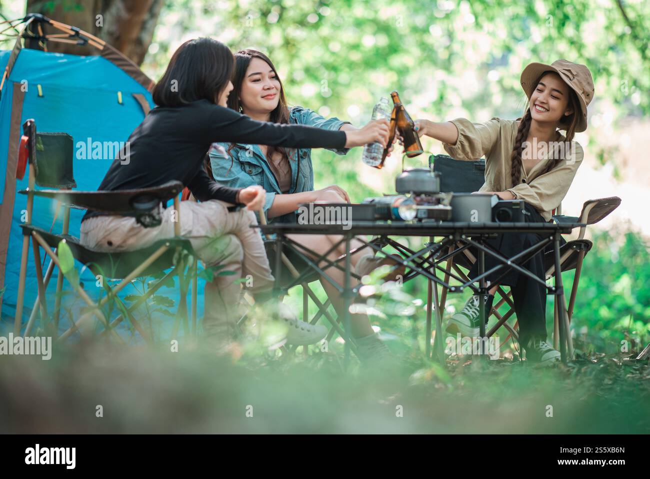 Group beautiful Asian women friends travelers relaxing at front of ...