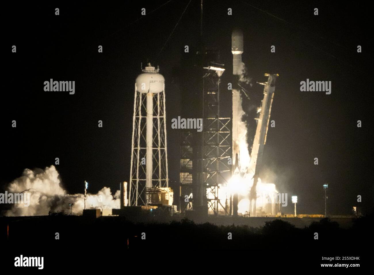 A SpaceX Falcon 9 rocket lifts off from pad 39A with a payload of a pair of lunar landers at the ...