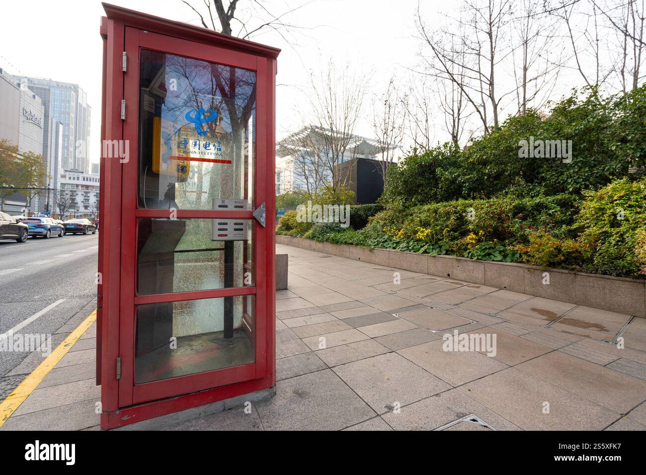 Shanghai, China. January 7, 2025. a telephone booth on a city centre ...