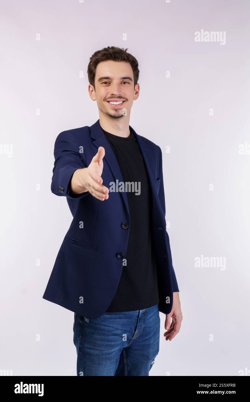 Portrait of smiling handsome businessman extend hand for handshake ...