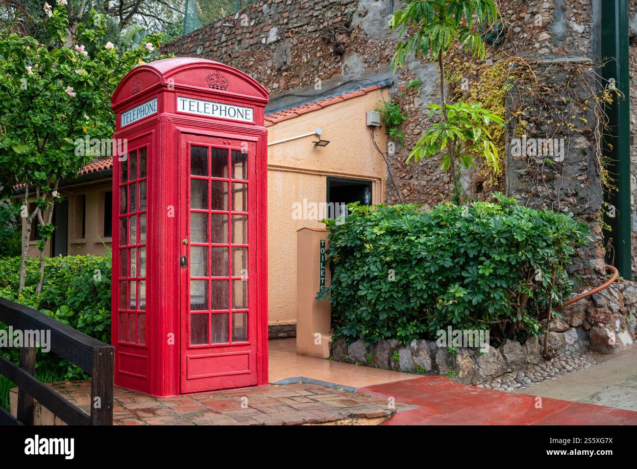 Gibraltar, UK 31 December 2024 red vintage english telephone booth ...