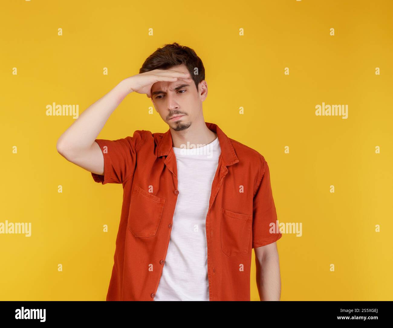 Portrait of thinking man surrounded by question mark on isolated ...