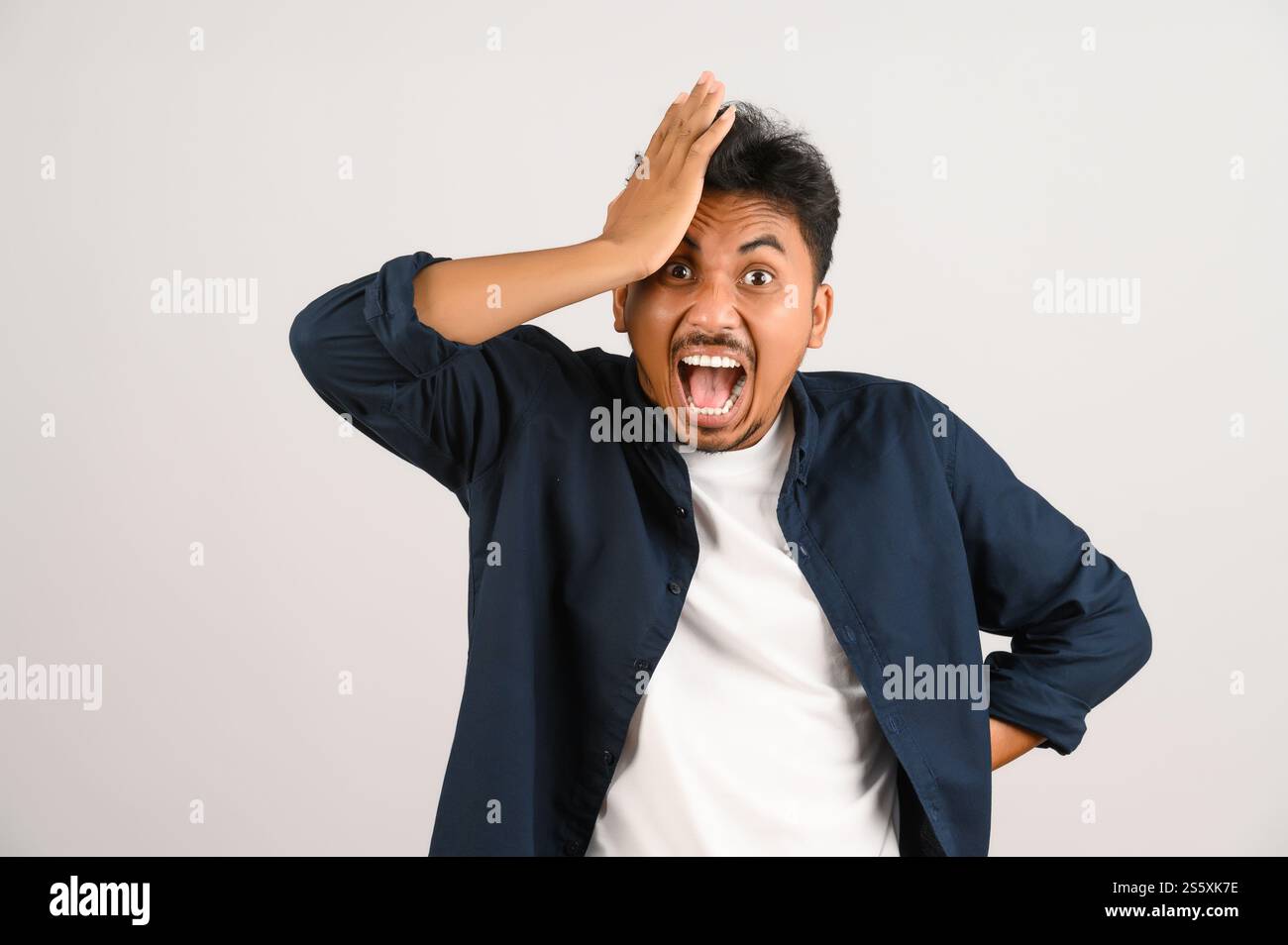 Frustrated man in white shirt hi-res stock photography and images - Alamy
