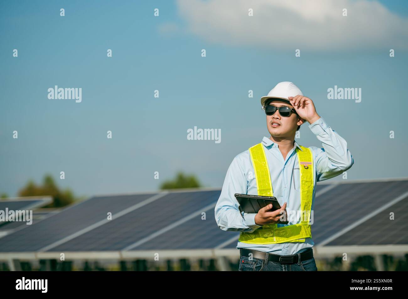 Portrait asian young engineer man wearing protective clothes hi-res ...
