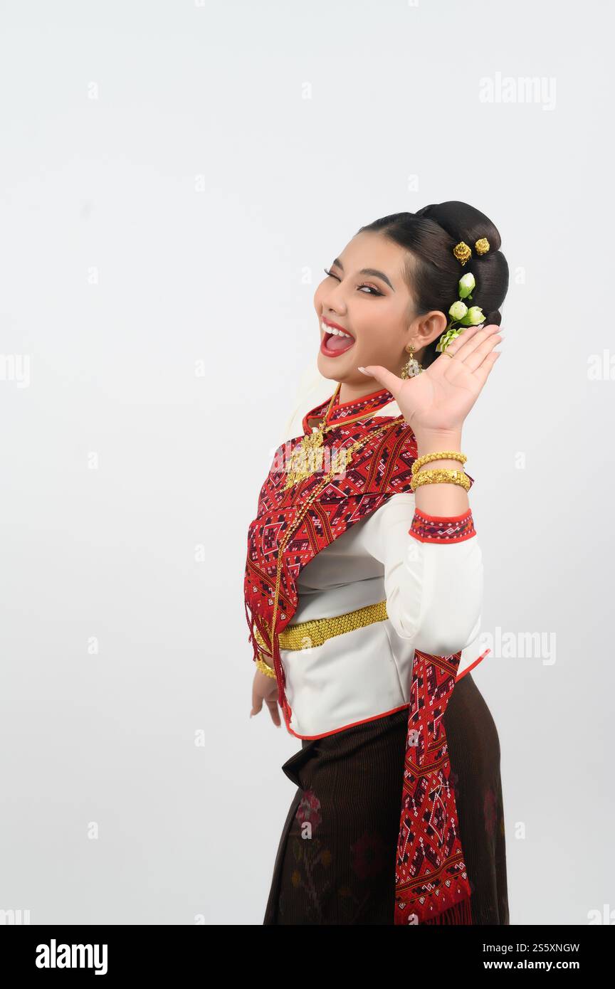 Side view, Portrait Young pretty woman dress up in beautiful local ...