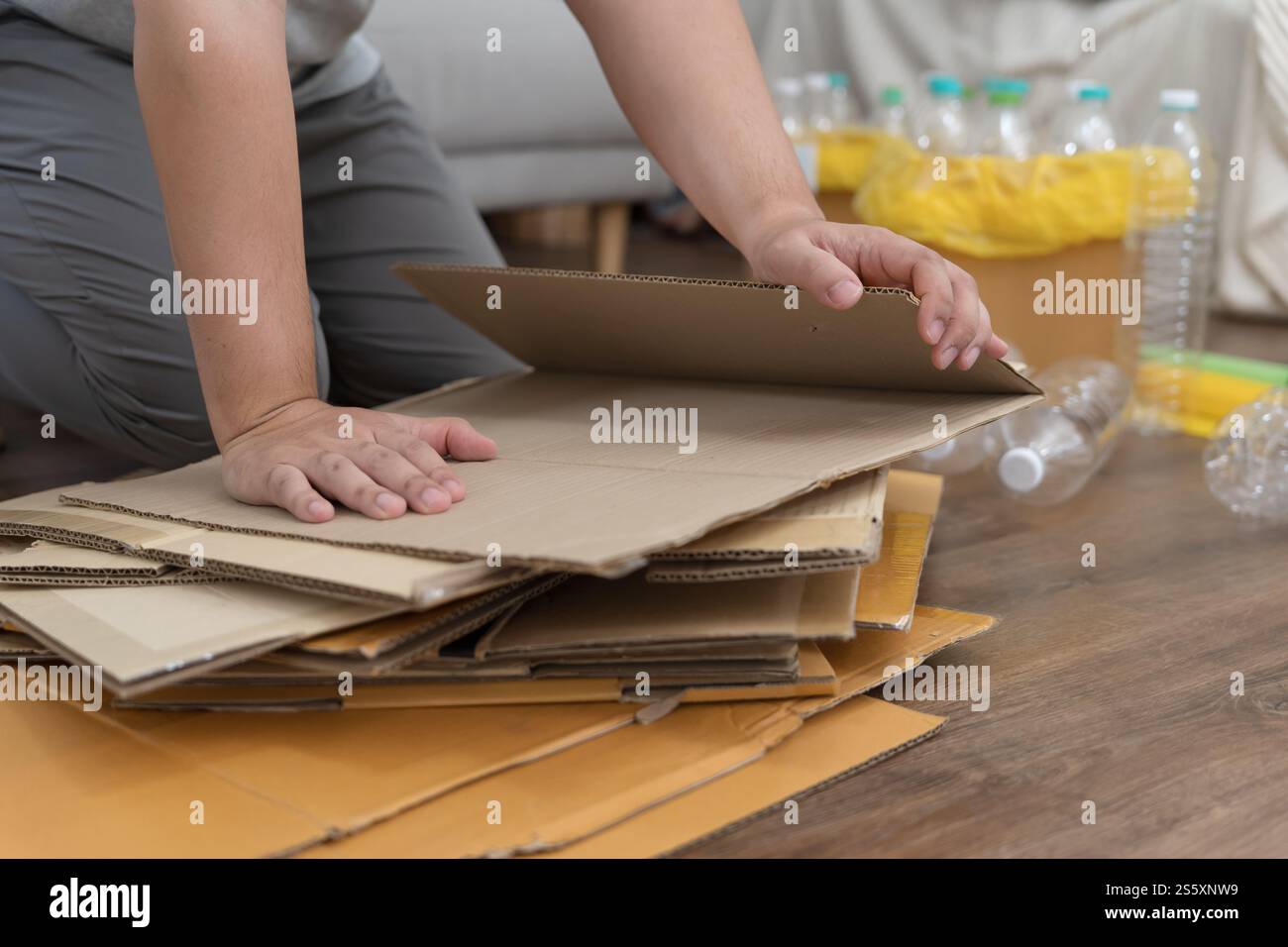 Home recycle eco zero waste concept Man using recycle paper box ...