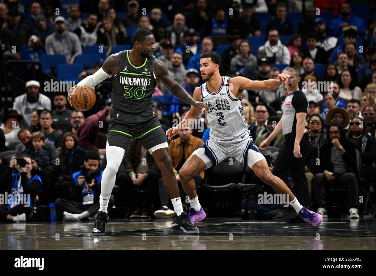Minnesota Timberwolves forward Julius Randle (30) is defended by ...