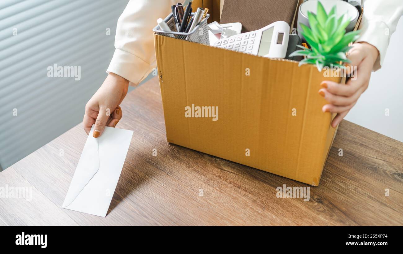 Business woman sending resignation letter and packing Stuff Resign ...