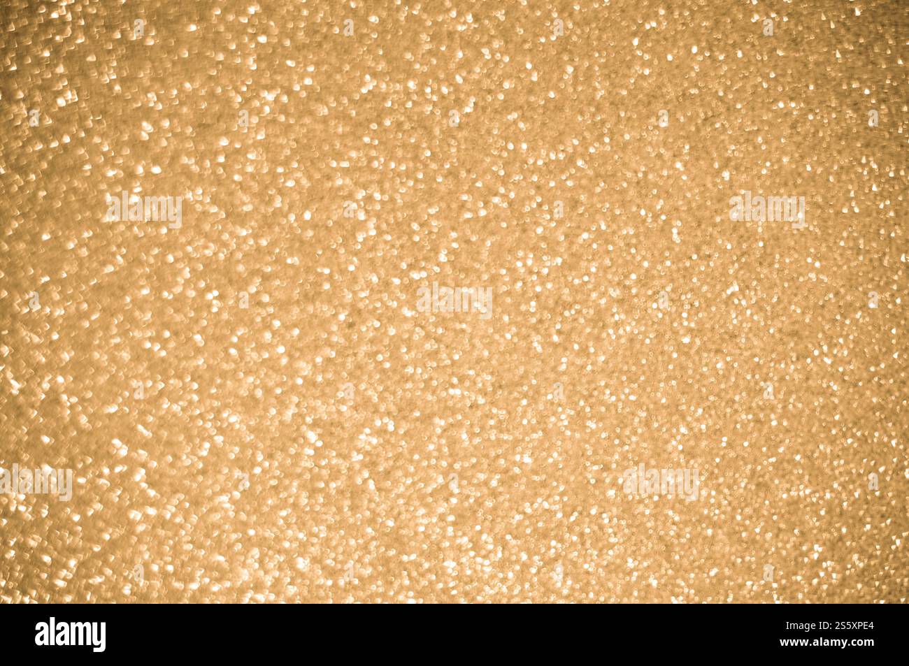Gold glitters background. shimmering blur spot lights Bokeh Shiny gold light background texture ...