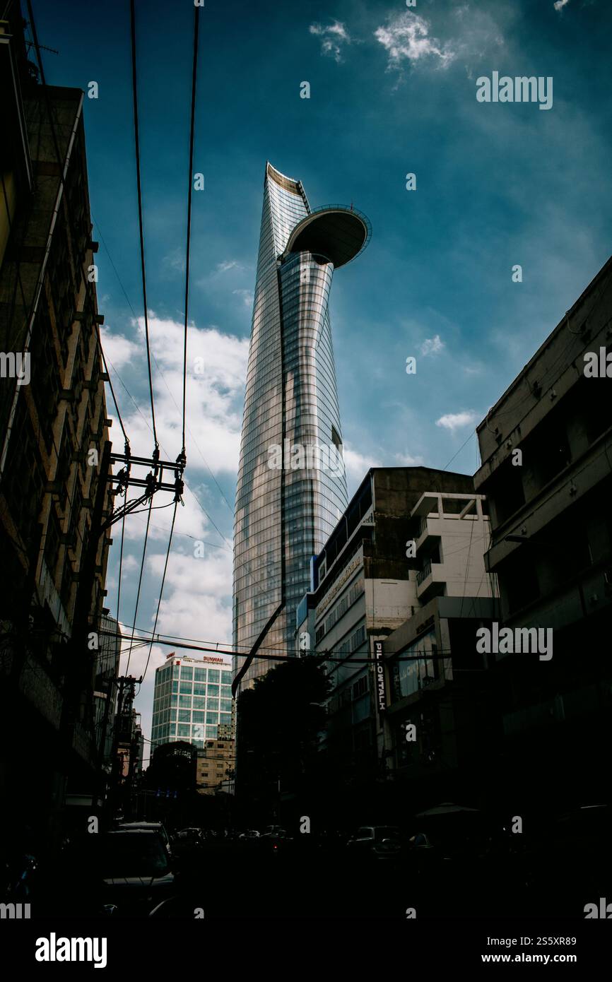 Bitexco Tower rises above the streets of Saigon, a symbol of modernity ...