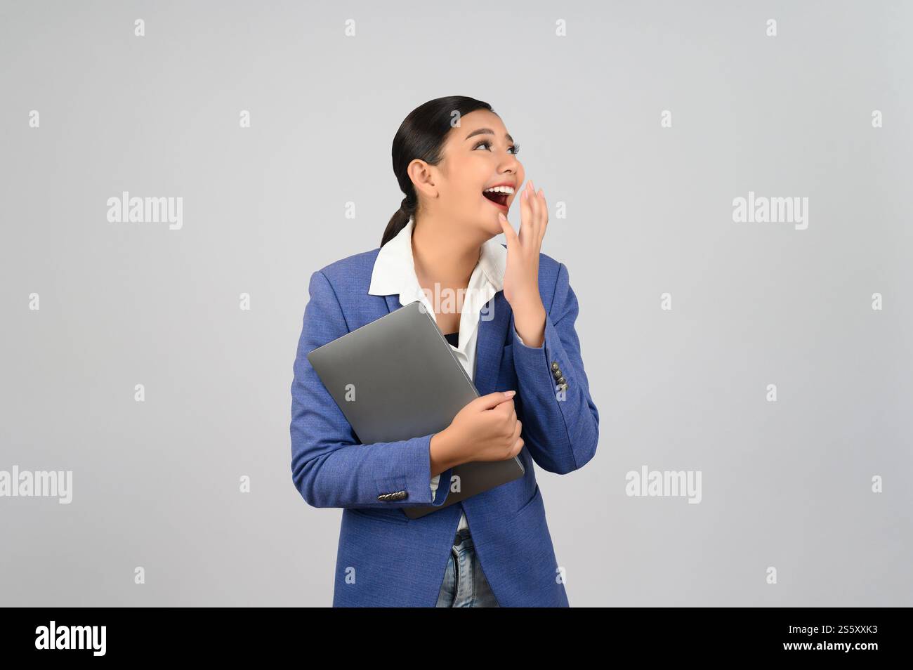 Portrait Asian young woman in officer uniform feel exciting during ...