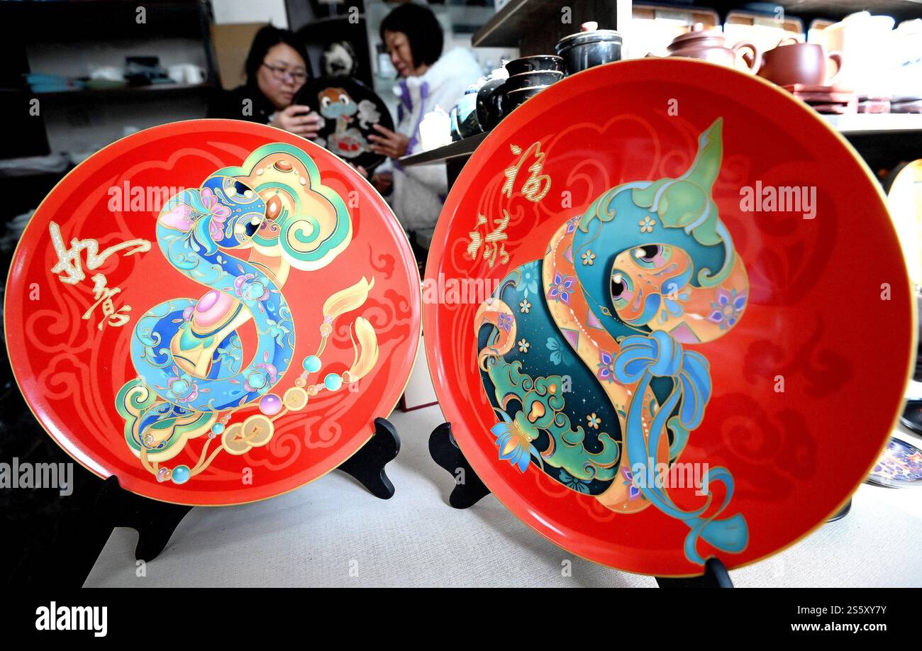 HANDAN, CHINA - JANUARY 15, 2025 - People look at the Year of the Snake ...