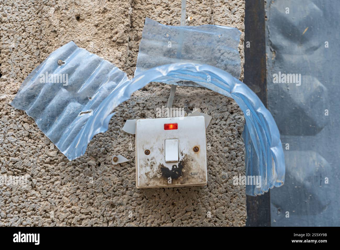 Old electrical switch on the outside entrance door, Basra, Iraq Stock ...