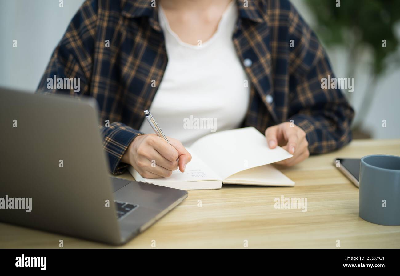 Portrait of Asian Business woman working from office taking reading and ...