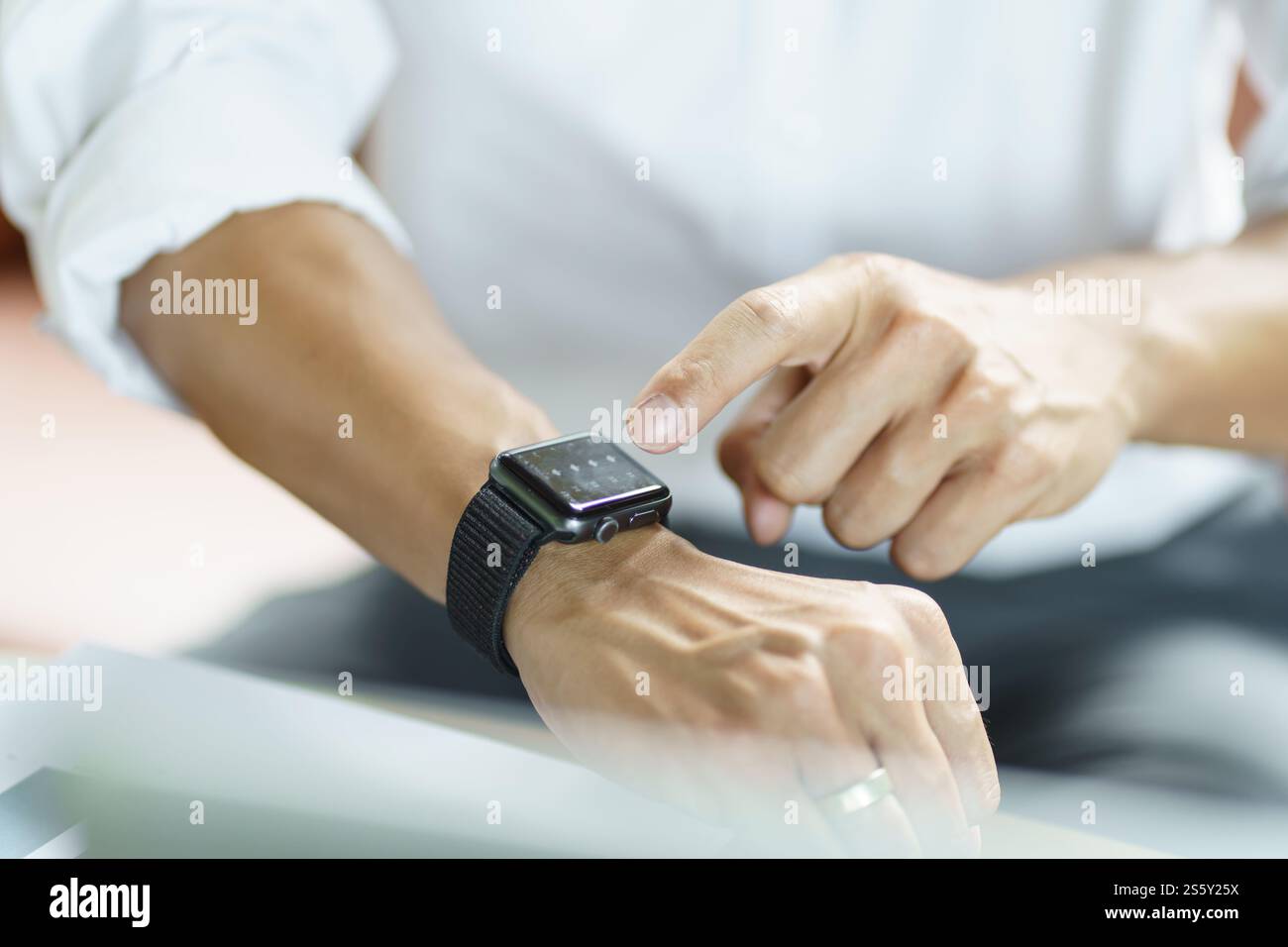 Business man Looking at smart watch In Office online connect Gadget ...
