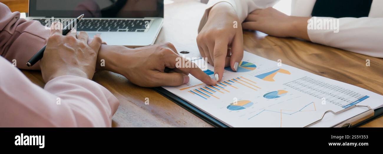 Team leader coach teach young workers explain on paper for business ...