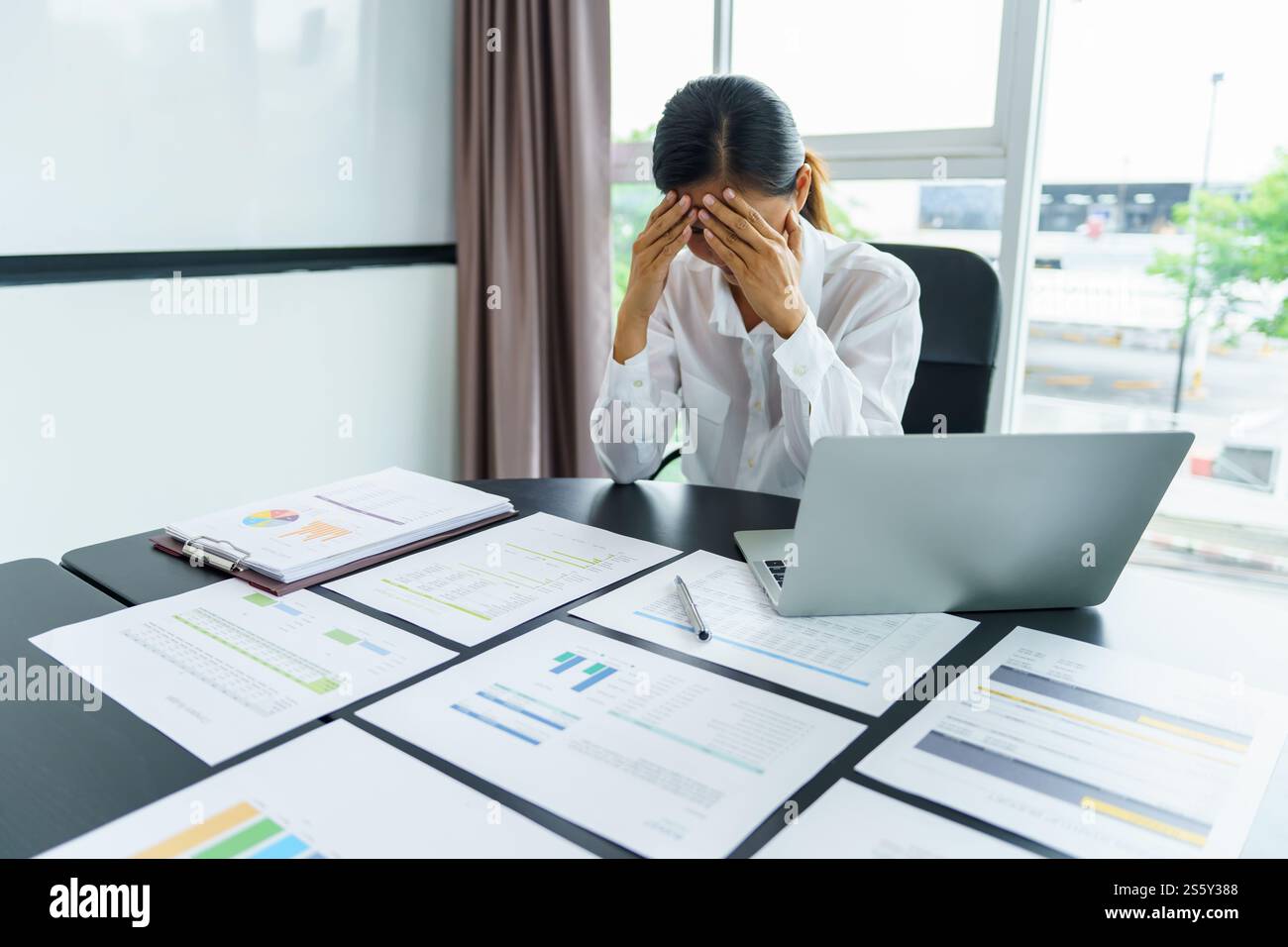 Burnout concept. Asian Business woman touching forehead having headache ...