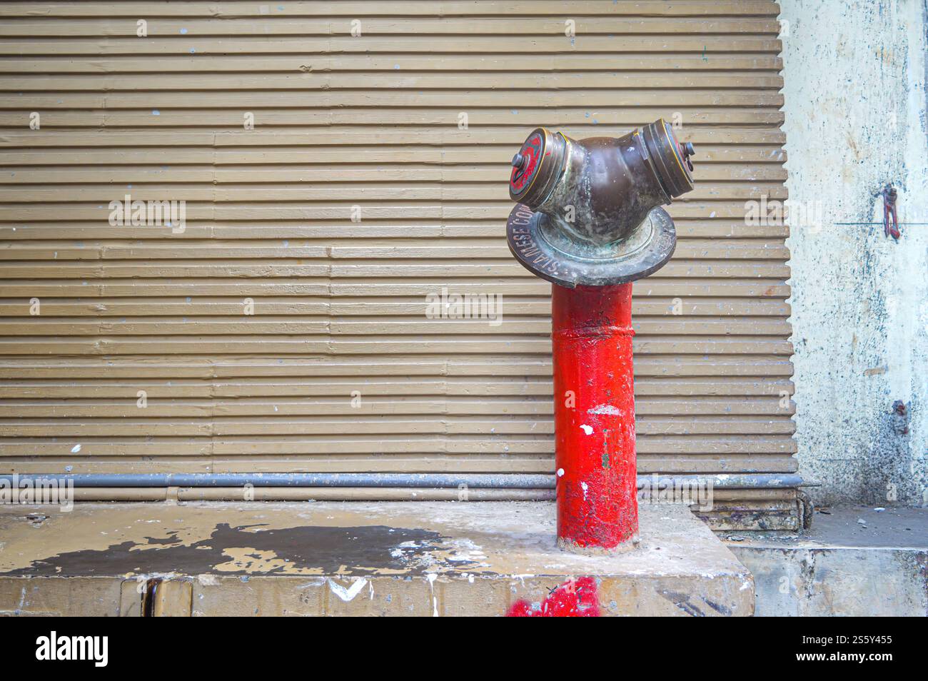 a fire hydrant fireplug on the side of the road, Indonesia, 14 June ...